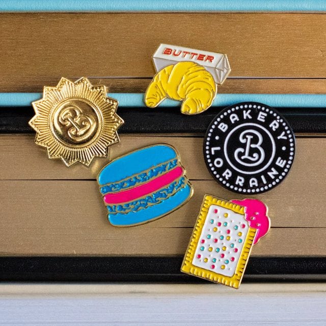 History and Origins of Enamel pins – All you Need to Know - WhiteOut Press